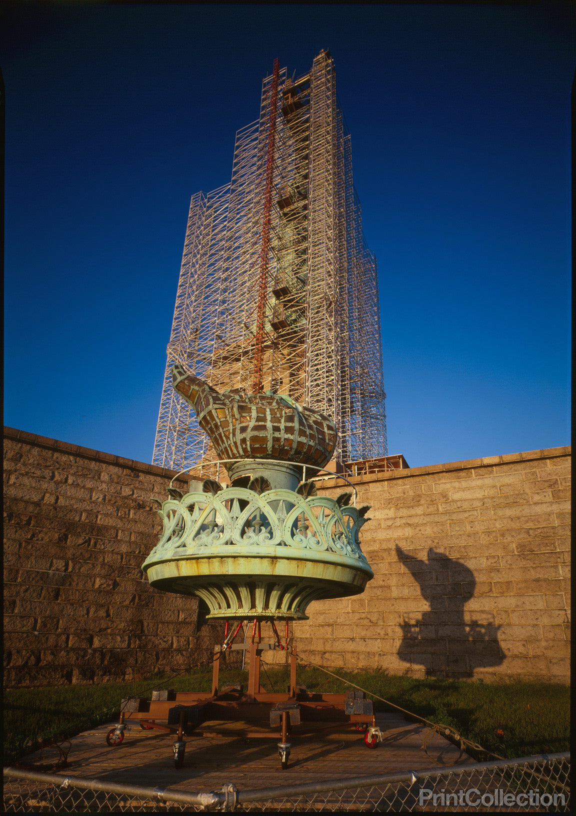 Print Collection - Flame and Torch Platform Sitting at the Base of ...